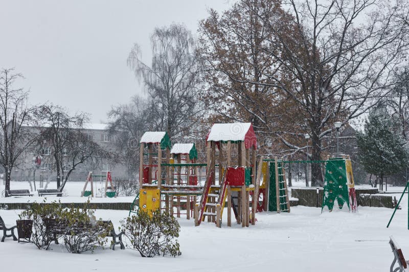 Children Playground in Winter Snow Covered Snowfall Stock Photo - Image ...
