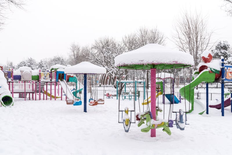 Children Playground in Winter Snow Stock Image - Image of game ...