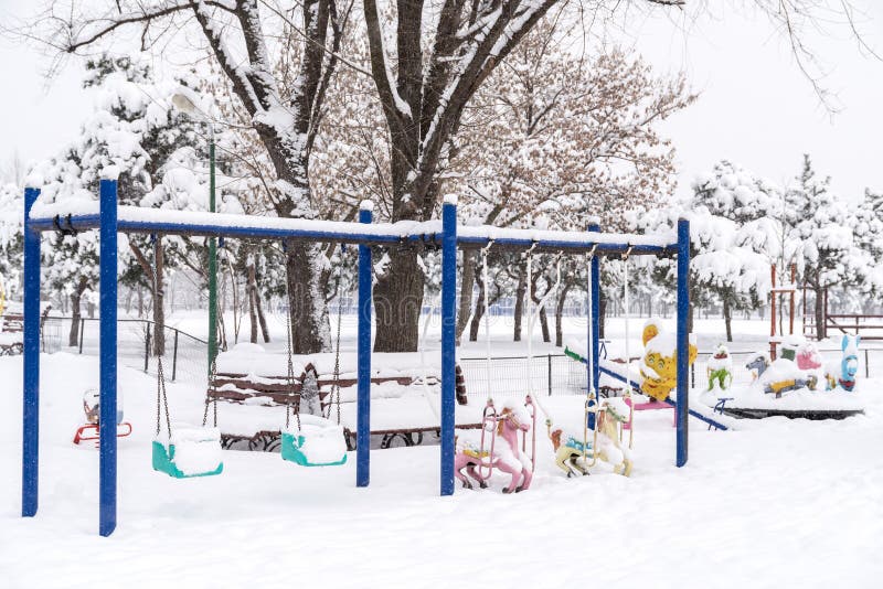 Children Playground in Winter Snow Stock Image - Image of playground ...