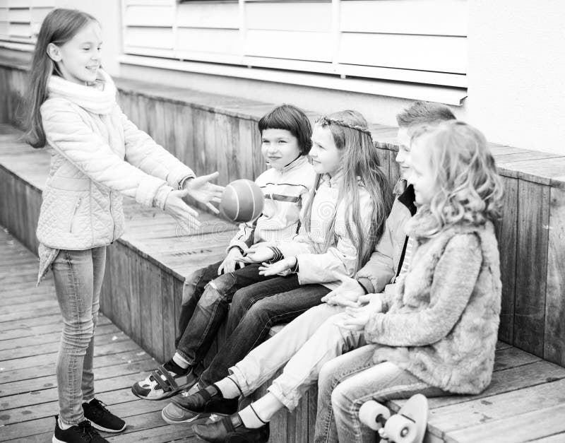 Children Playing with Ball on Bench Stock Image - Image of people ...