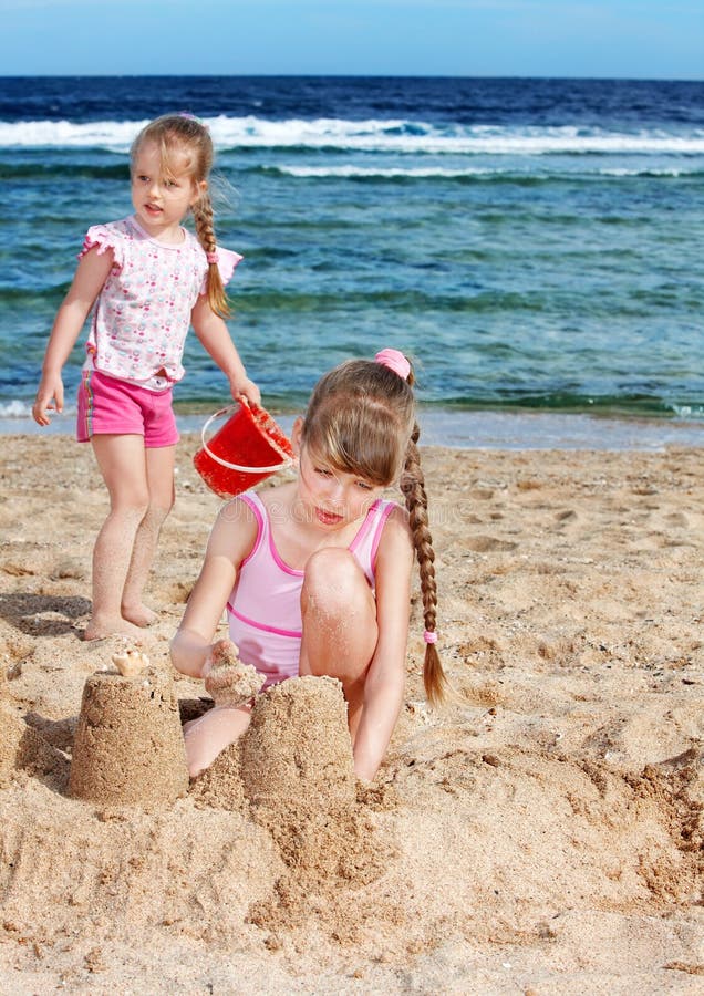 Children playing on beach. stock photo. Image of play - 19219058