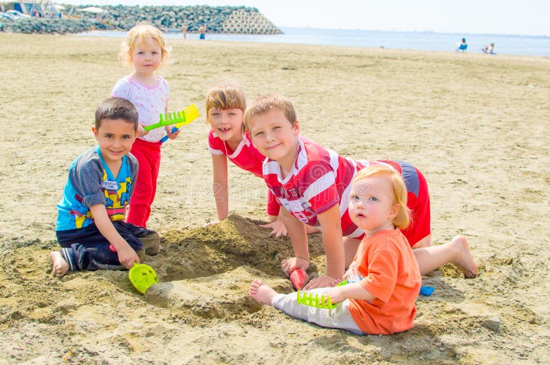 Children Playing at the Beach Stock Photo - Image of friendship, casual ...