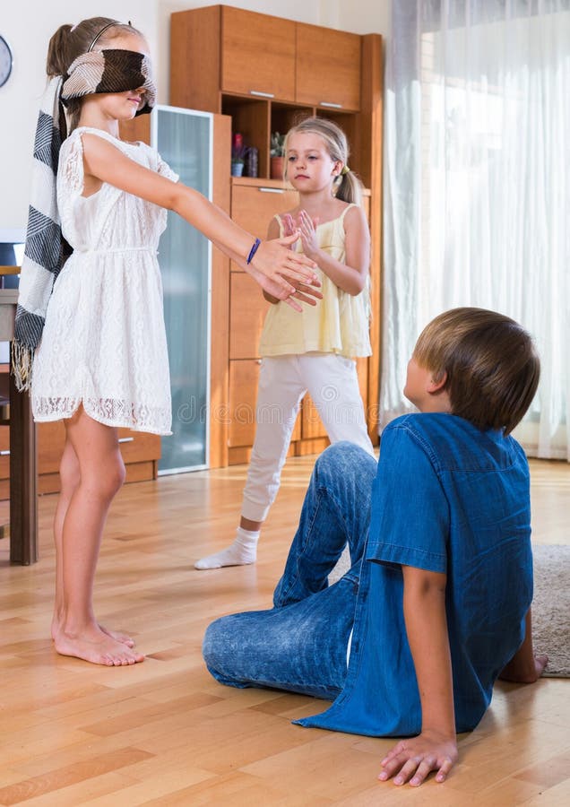 Children Playing at Blind Man Bluff Indoors Stock Image - Image of kids ...