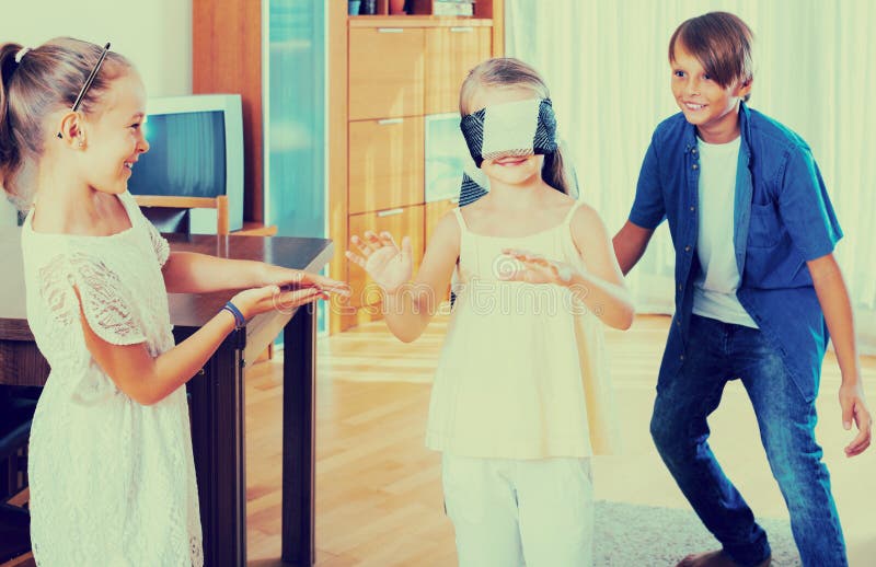 Children Playing at Blind Man Bluff Indoors Stock Image - Image of ...