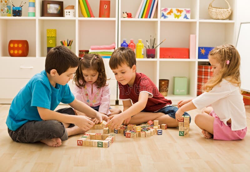 Children Playing with Blocks Stock Photo - Image of green, girls: 13836022