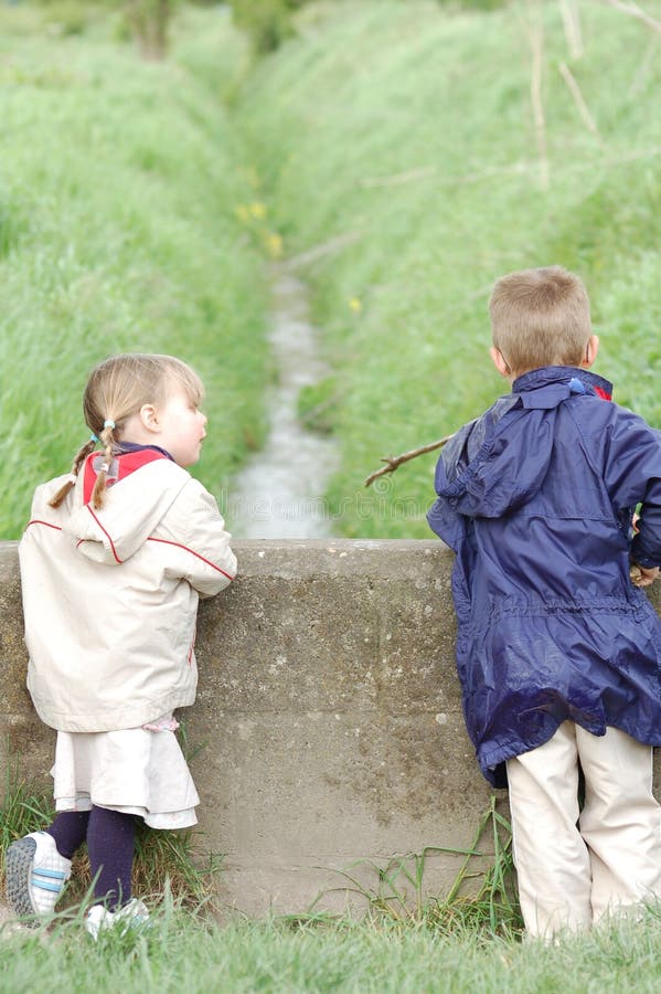 CHildren Playing at Bridge stock photo. Image of look - 5198840