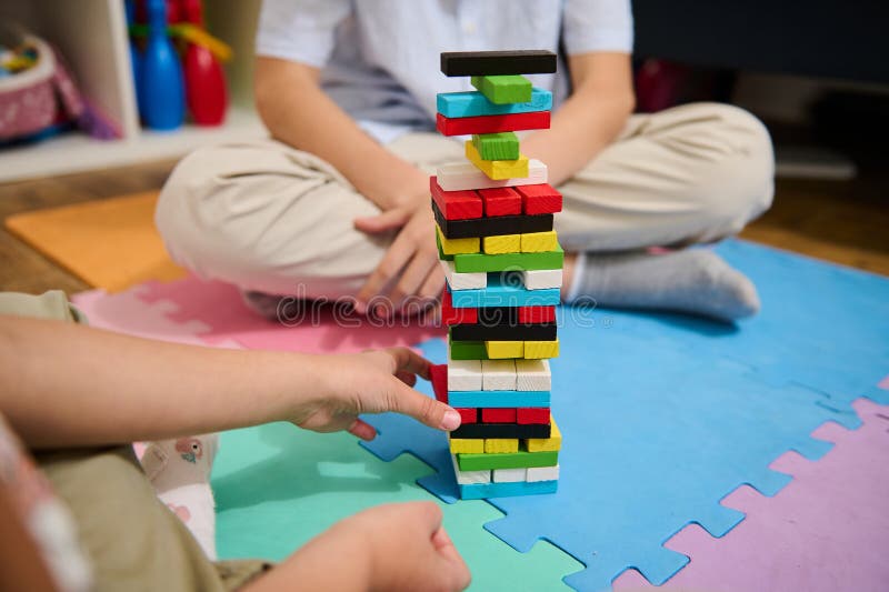 Children Playing a Colorful Block Stacking Game on a Play Mat Stock Photo - Image of leisure ...