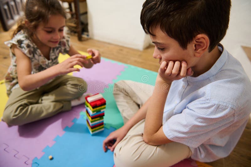 Children Playing with Colorful Building Blocks in a Fun Learning ...