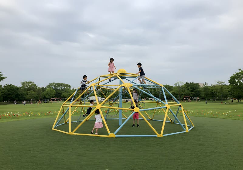 Children Playing on a Colorful Geometric Climbing Structure in a Park ...