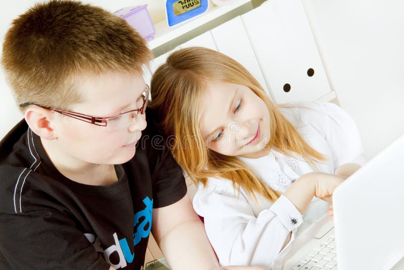 Children Playing Computer in Room Stock Photo - Image of girl ...