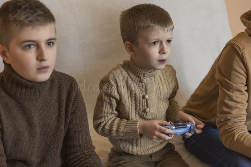 Children Playing on the Console Stock Photo - Image of people, father ...