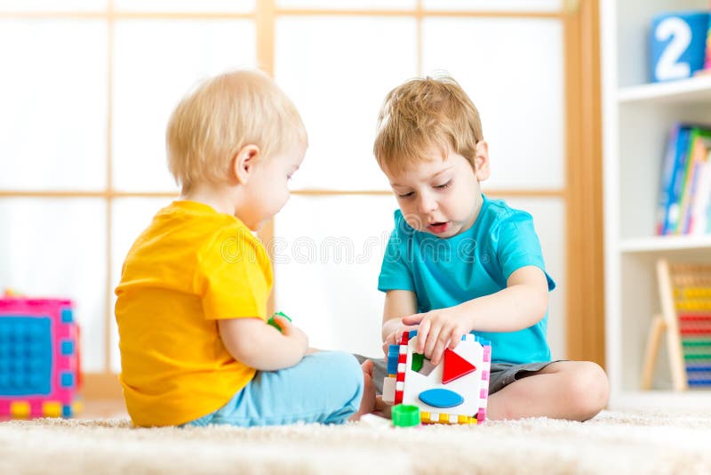 Children Playing with Educational Toys, Arranging and Sorting Colors ...