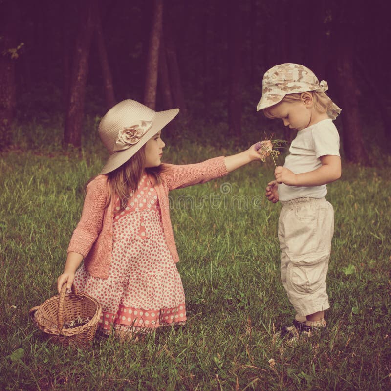 Children Playing with Flowers Stock Photo - Image of leisure, childhood ...
