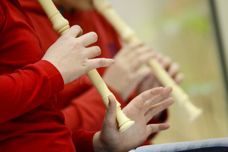 Children playing flute stock image. Image of children - 87312105