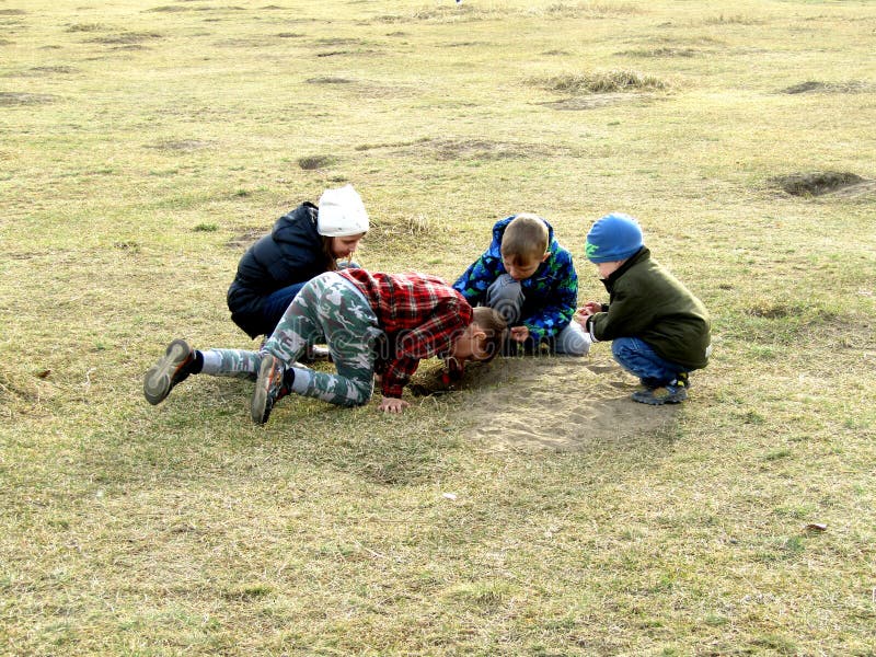 Children Playing on the Grass Editorial Photography - Image of playing ...