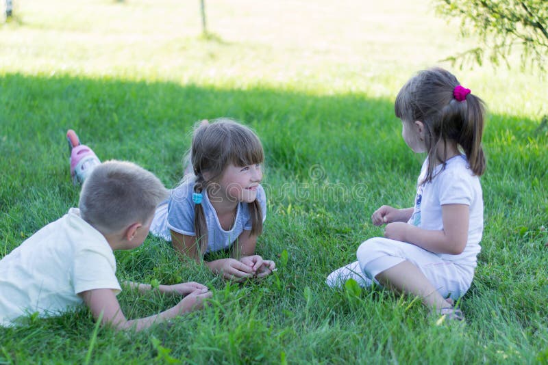 Children Playing on the Grass Stock Image - Image of friendship, family ...