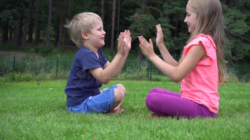 Children Playing on the Grass Stock Footage - Video of happy, caucasian ...