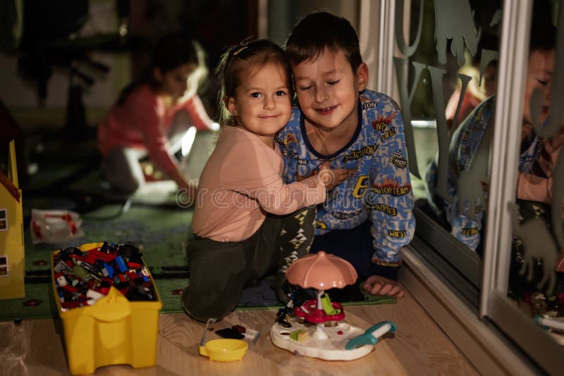 Children Playing at Home during a Blackout Using Alternative Lighting ...
