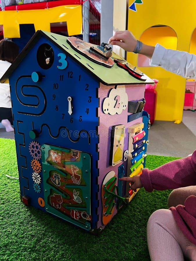 Children Playing with Interactive Educational Activity House Stock ...