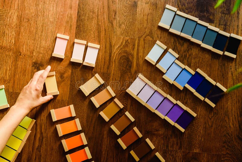 Children Playing and Learning with Montessori Color Tablets Stock Photo ...