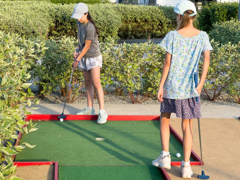 Children Playing Mini Golf. Child Golfer Stock Photo - Image of carpet ...
