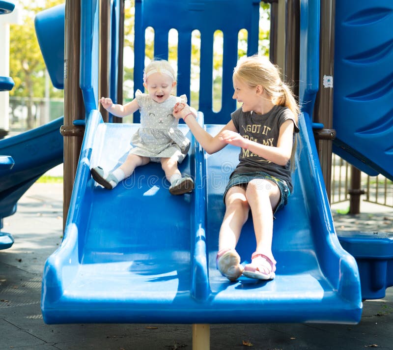 Children Playing at Playground Stock Photo - Image of playing ...
