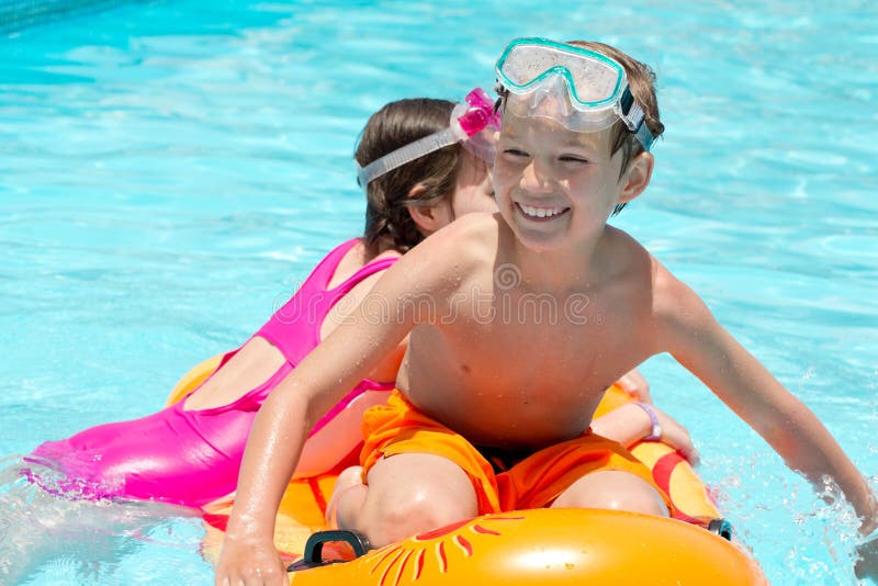 Children playing in pool stock photo. Image of face, bikini - 20338334