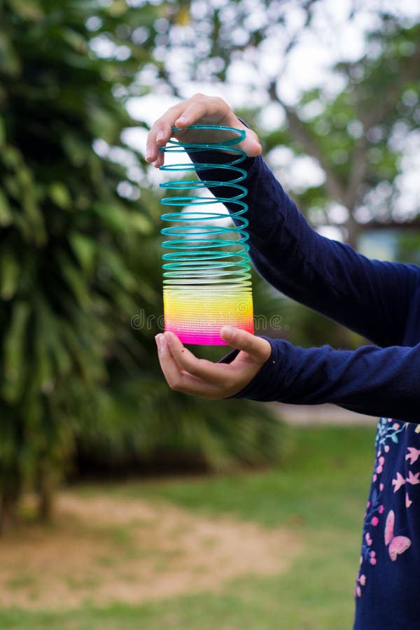 Children Playing with Rainbow Colored Wire Spiral Editorial Photography ...