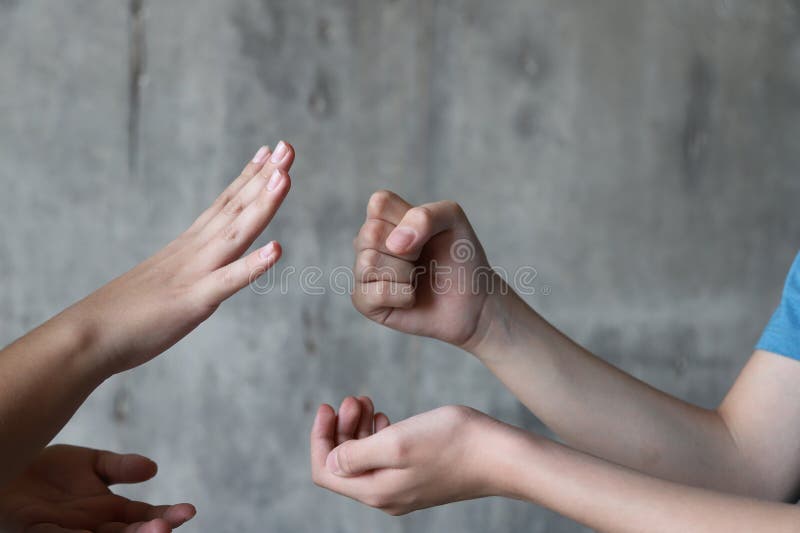 Children Playing Rock Paper Scissors. Gray Background with Copy Space ...