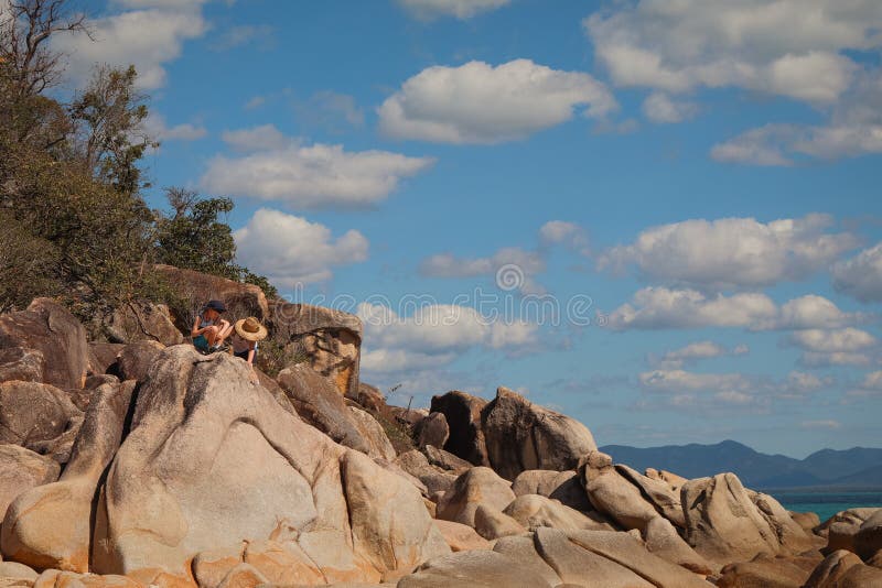 Children Playing on Rocks at the Beach Stock Image - Image of rocks ...