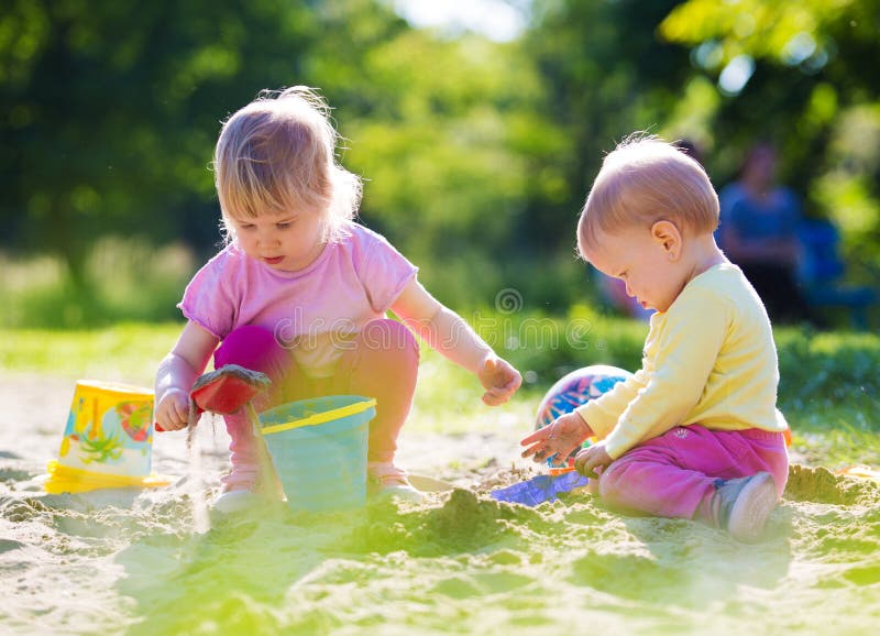 Children Playing in Sandbox Stock Image - Image of toddler, blond: 77274285