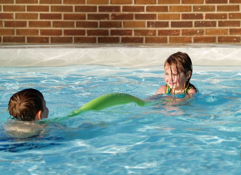 Children Playing in Swimming Pool Stock Image - Image of children, girl ...