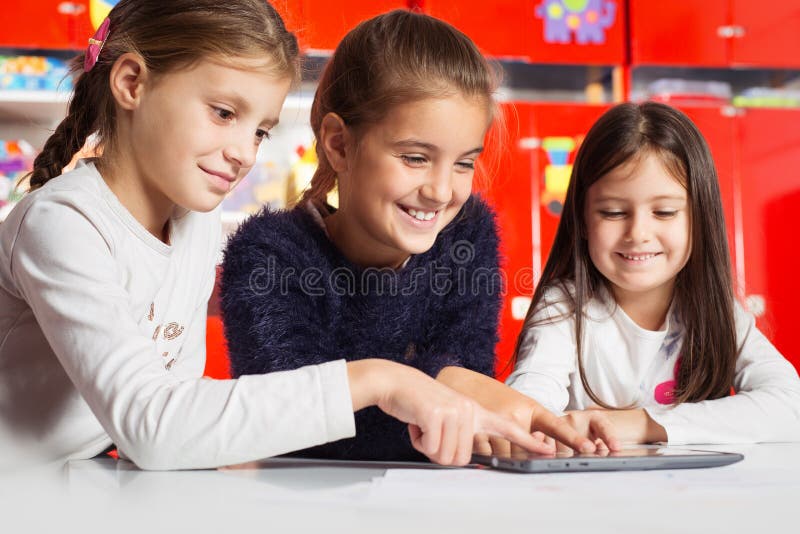 Children Playing on Tablet. Stock Photo - Image of concentration ...