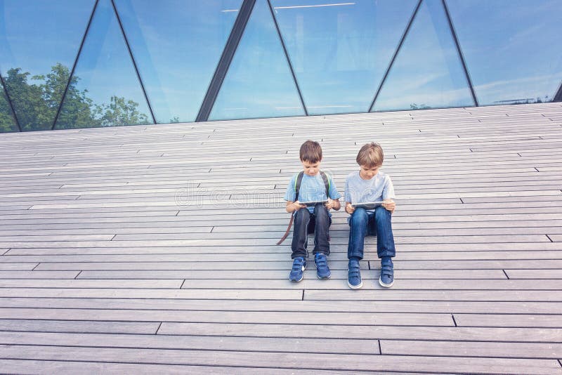 Children Playing with Tablet Computer Outdoor. People Education ...