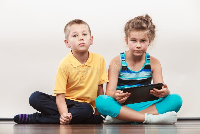 Children Playing on Tablet. Stock Image - Image of showing, connection ...