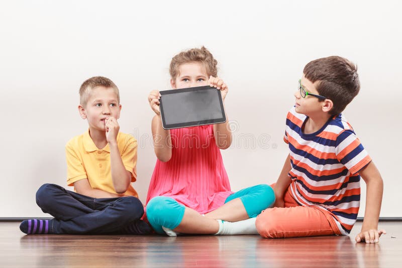 Children Playing on Tablet. Stock Photo - Image of girl, home: 73401330