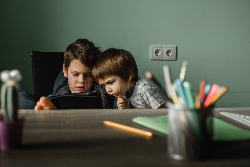 Children Playing Tablet at Home, Growing Up with Technology Stock Photo ...