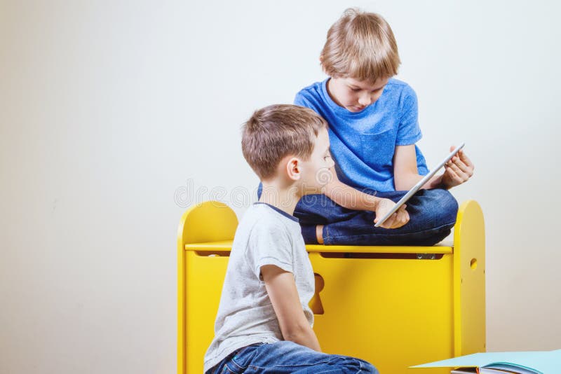 Children Playing on Tablet at Home Stock Photo - Image of device ...