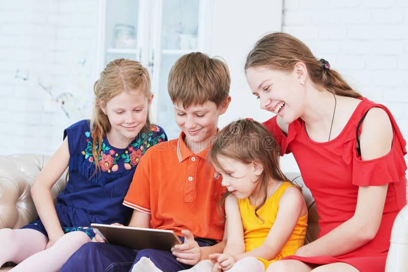 Children Playing on Tablet Computer Stock Photo - Image of siblings ...