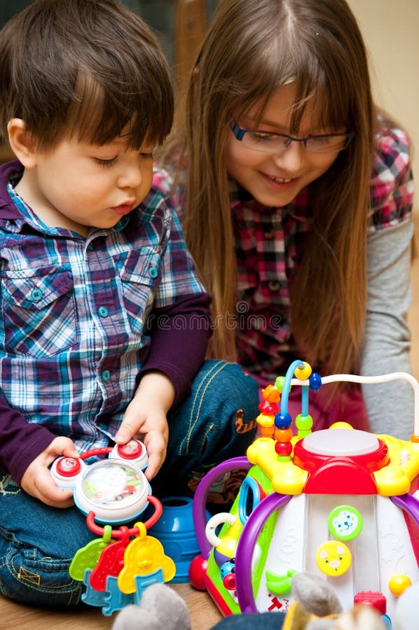 Kids playing at home stock image. Image of play, playing - 17770145