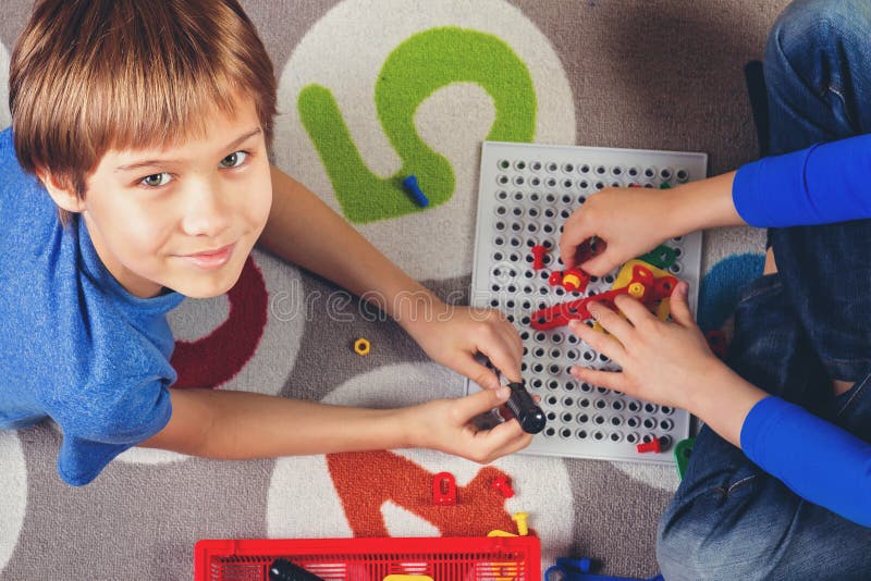 Children Playing with Toys Tool Kit.Top View Stock Photo - Image of ...