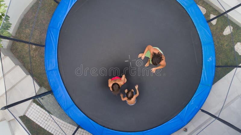 Children Playing on Trampoline Aerial View Stock Image - Image of ...