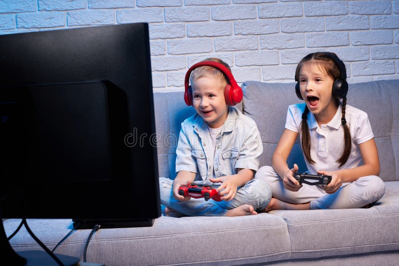 Children Playing Video Game with Game Console Stock Image - Image of ...