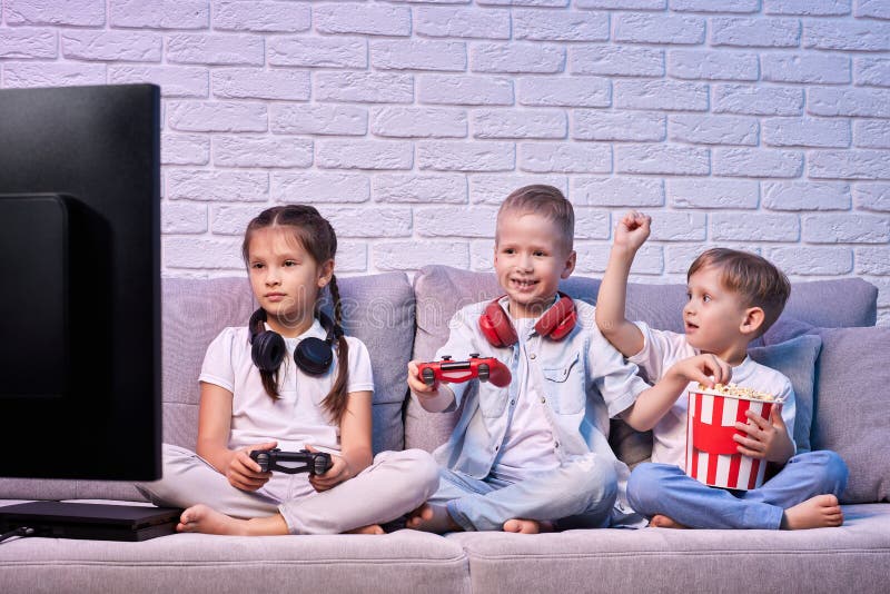 Children Playing Video Game with Game Console Stock Photo - Image of ...