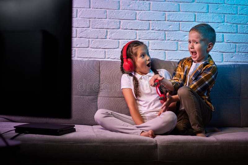 Children Playing Video Game with Game Console Stock Photo - Image of ...