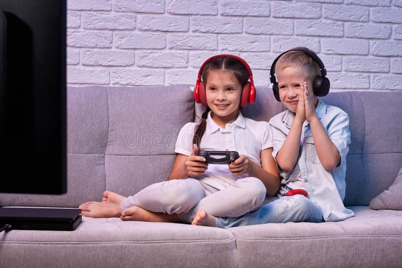 Children Playing Video Game with Game Console Stock Photo - Image of ...