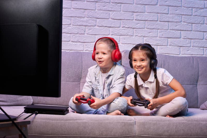 Children Playing Video Game with Game Console Stock Photo - Image of ...