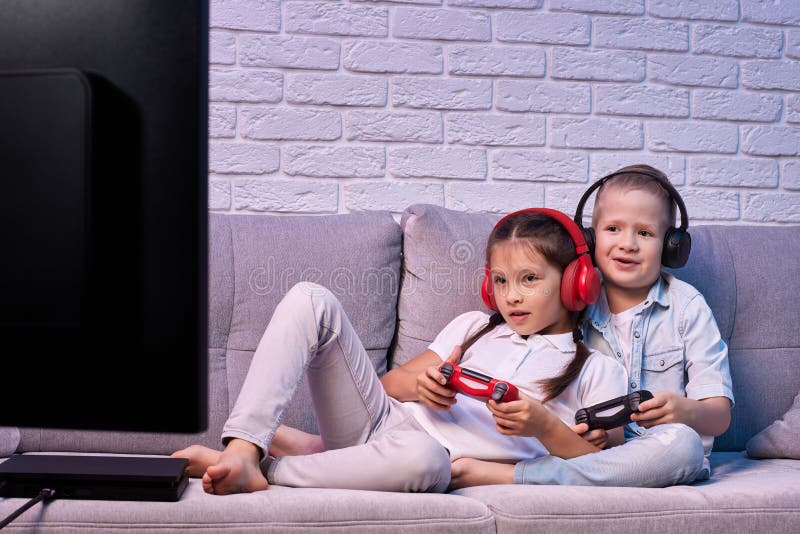 Children Playing Video Game with Game Console Stock Photo - Image of ...