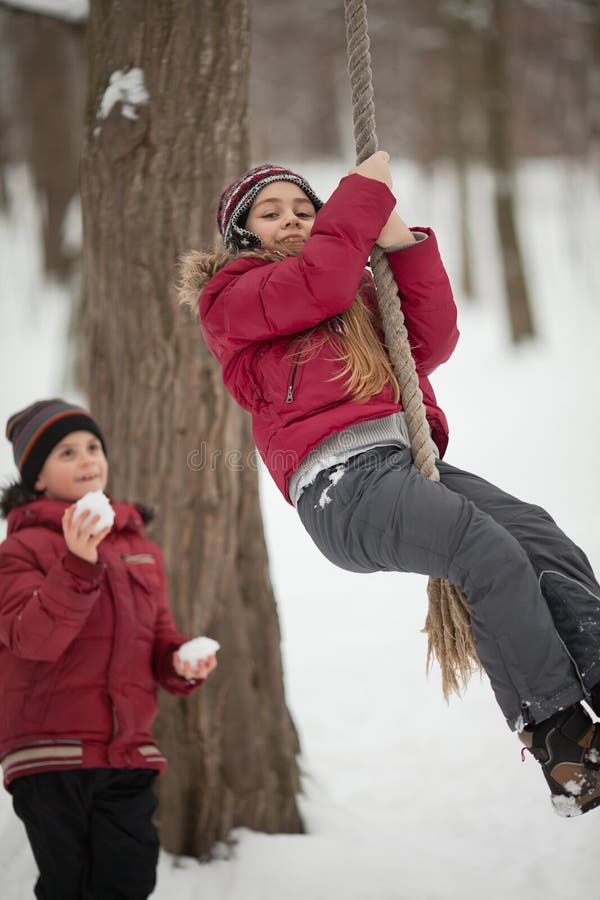 Children Playing in Winter Park Stock Photo - Image of holiday, playing ...