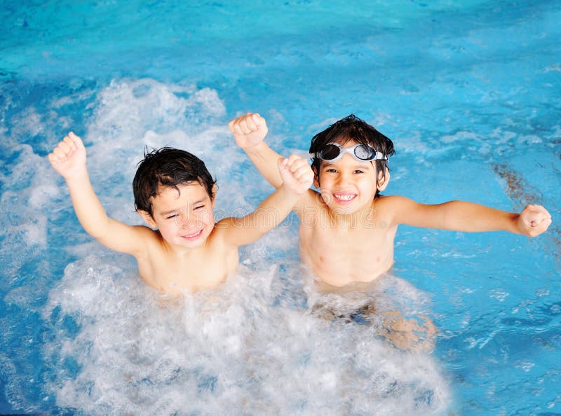Children in swimming pool stock photo. Image of children - 2674302